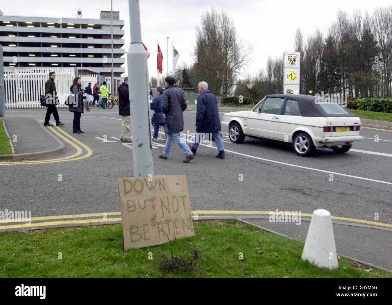 Workers arrive at the Rover plant, Longbridge for their shift. The ...