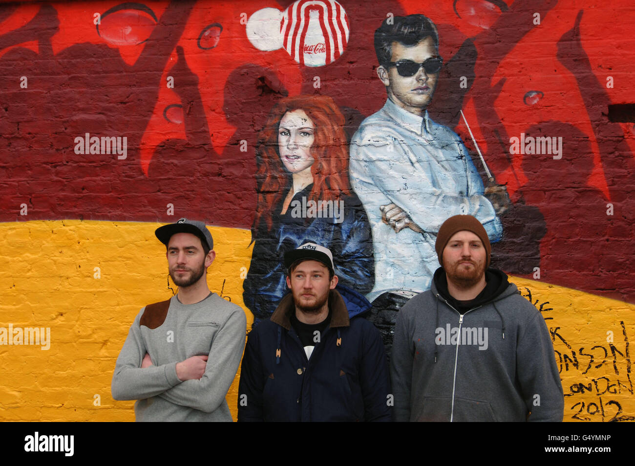 Artists, from left, Neil Edward, Hadley Ever and Sam Bates unveil the ...