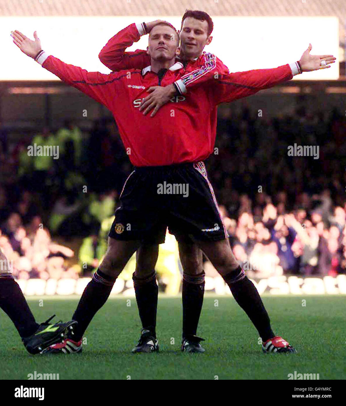 Manchester United's David Beckham celebrates after scoring during the ...