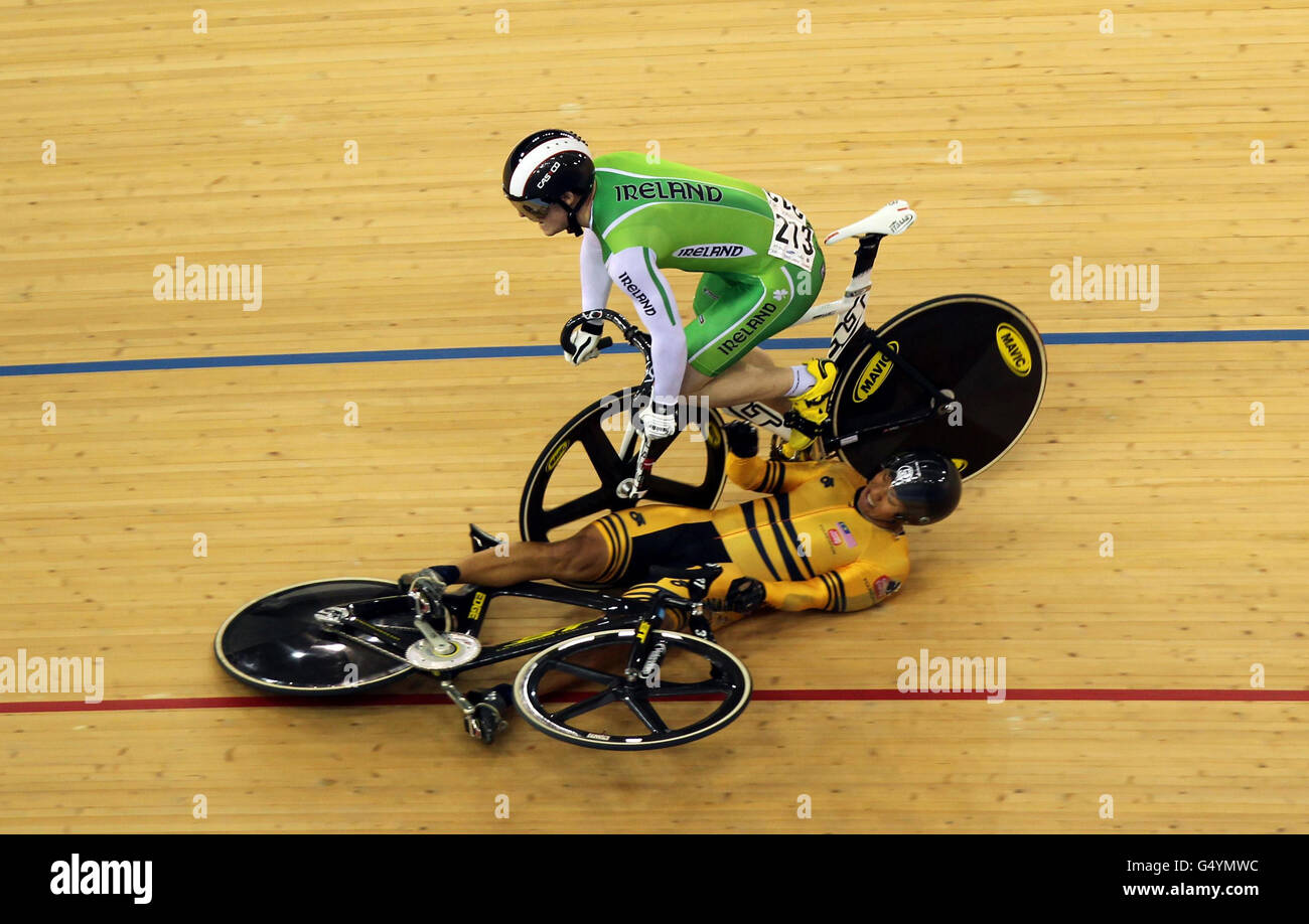 Ireland's Eoin Mullen (top) crashes into Malaysia's Josiah Ng in the ...