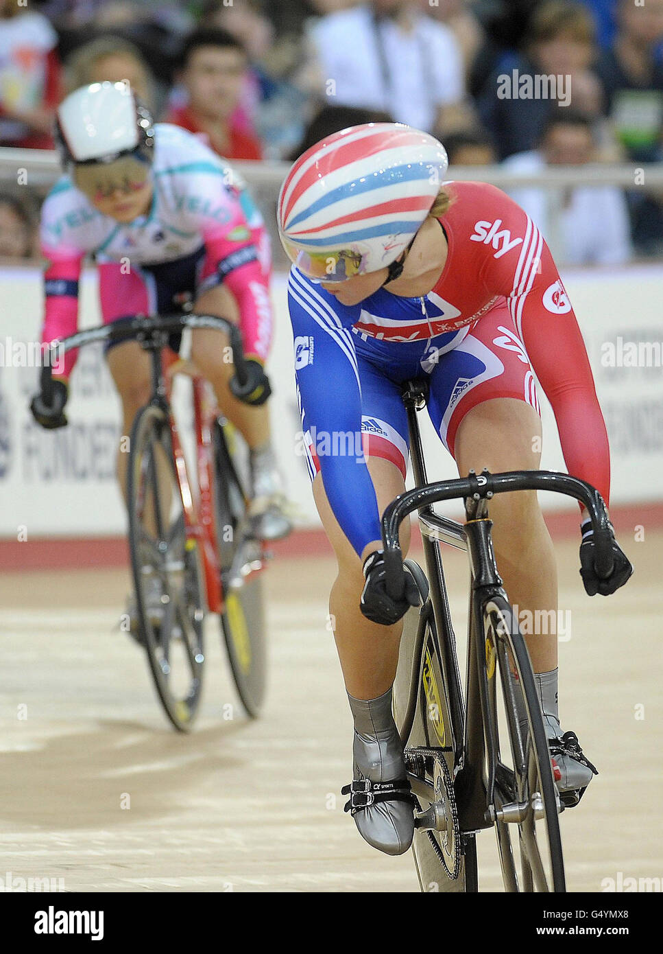 Britain's Jess Varnish keeps an eye on Lin Junhong in her quarter final ...
