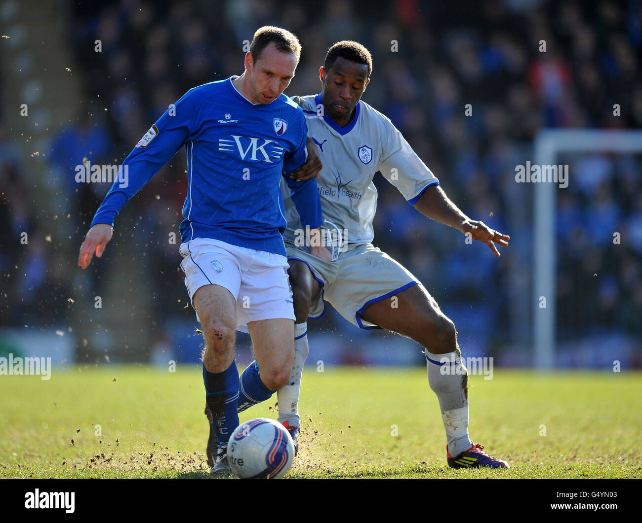 Chesterfield's Mark Allott comes away from Sheffield Wednesday's Jose ...