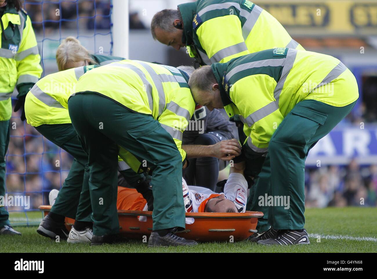 Blackpools gary taylor fletcher stretchered off following collision ...