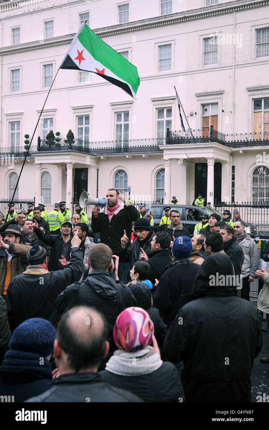 Protesters outside the Syrian Embassy in Belgrave Square in central ...