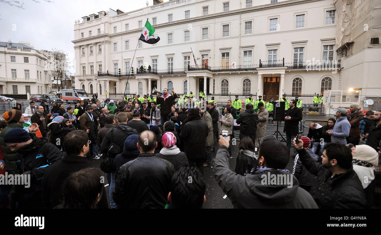 Protesters outside the Syrian Embassy in Belgrave Square in central ...