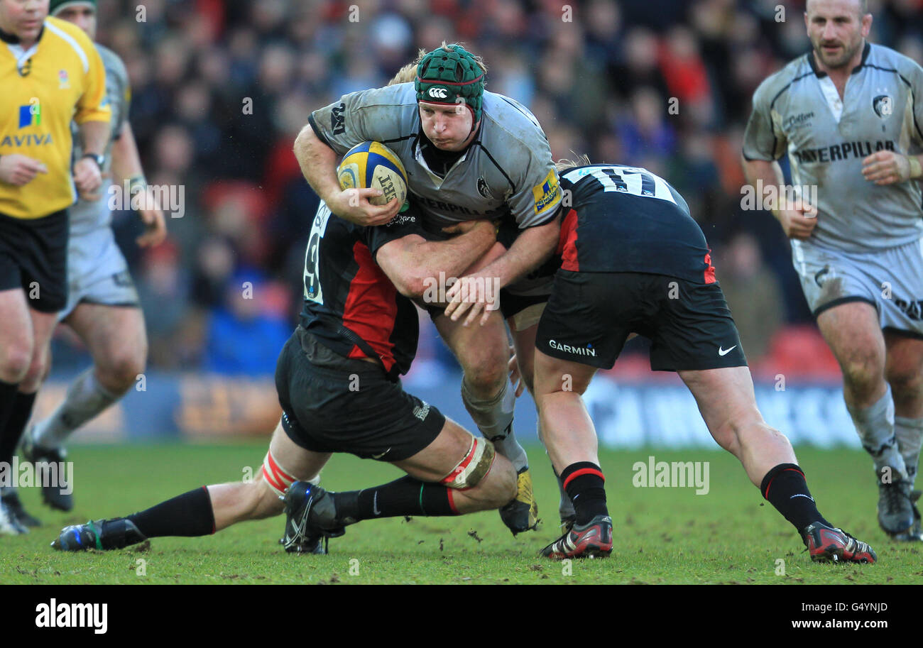 Saracens' Rhys Gill and Hugh Vyvyan tackle Leicester Tigers' Thomas ...
