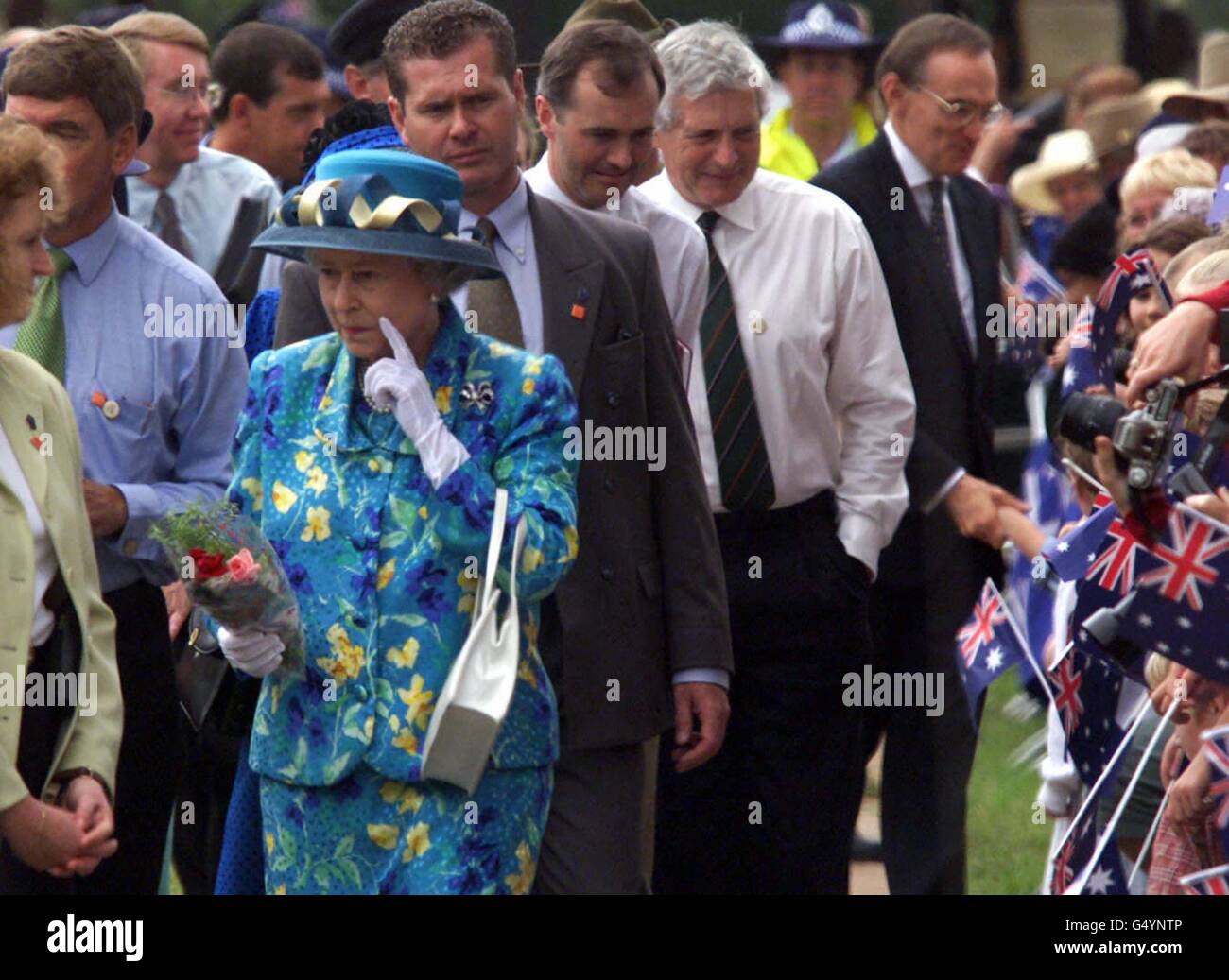 The Queen walks through the crowds lining Central Park in the centre of ...