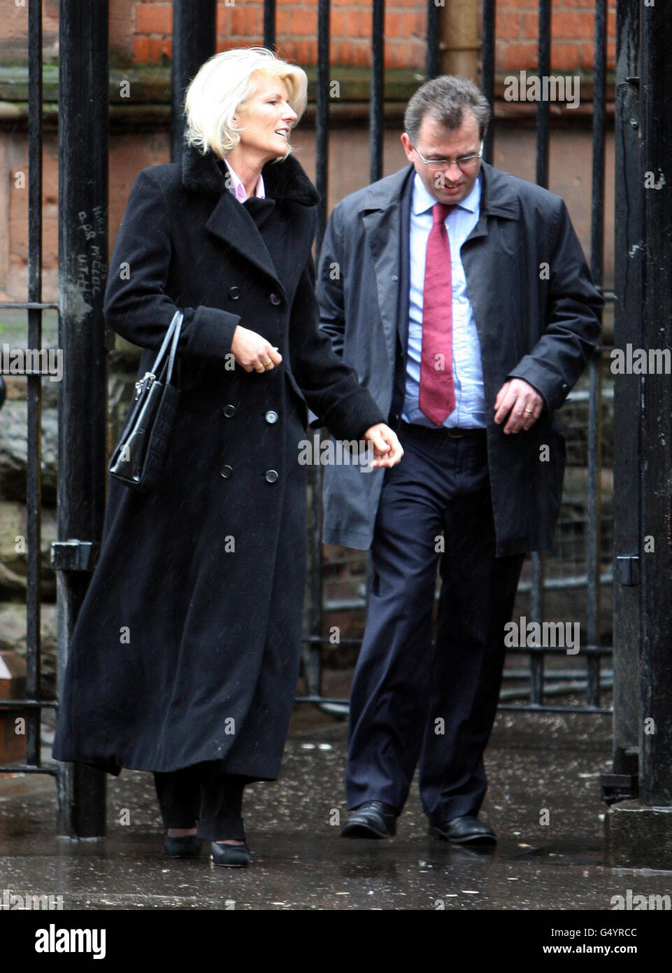 Thandi Wooldridge, leaves an inquest into the death of her husband, Ian ...