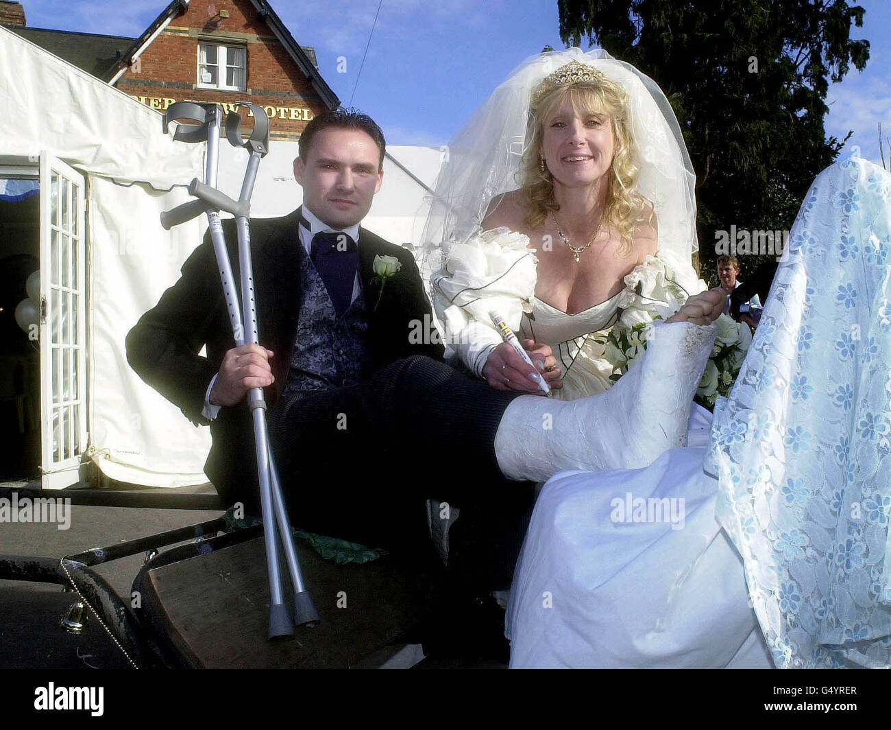 Football wedding broken Leg Stock Photo - Alamy