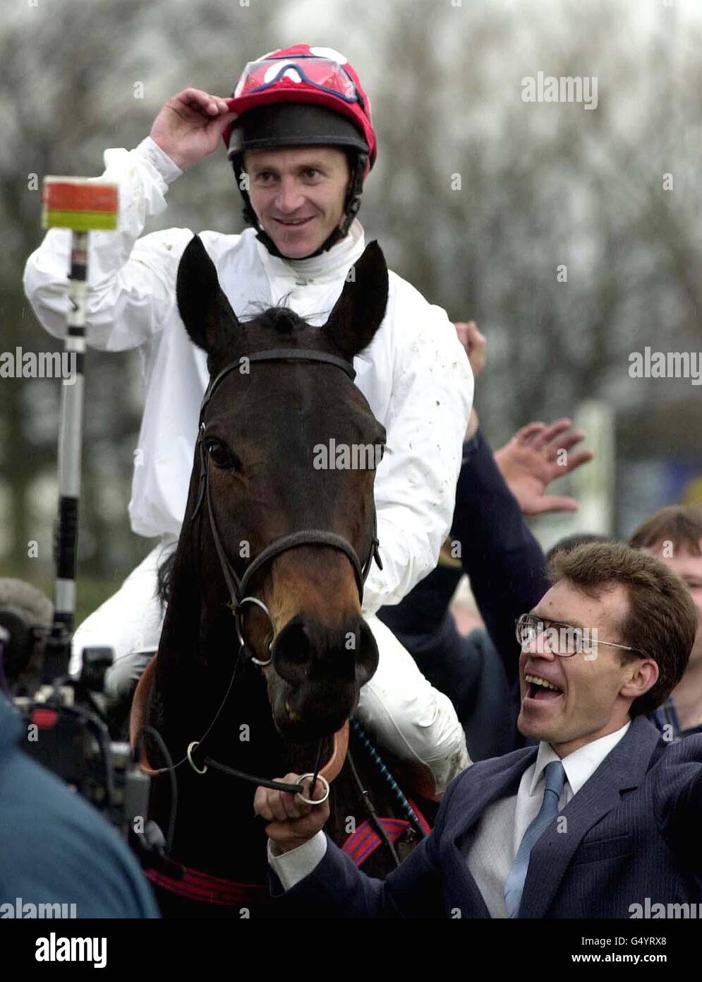 Jockey Jimmy Fortune celebrates winning The Worthington Lincoln on John ...