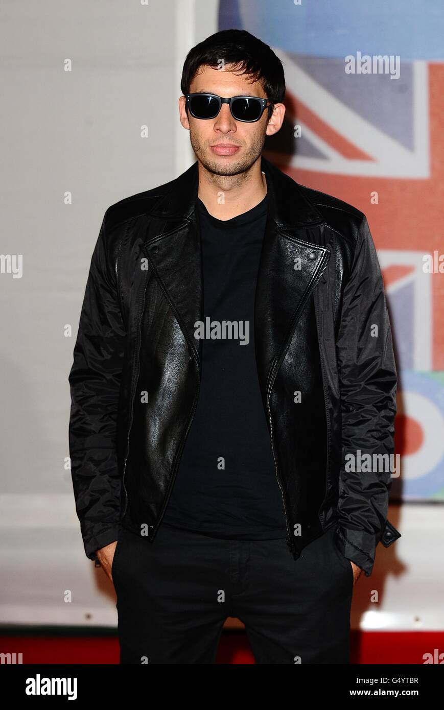 Elliot John Gleave aka Example arriving for the 2012 Brit Awards at The ...