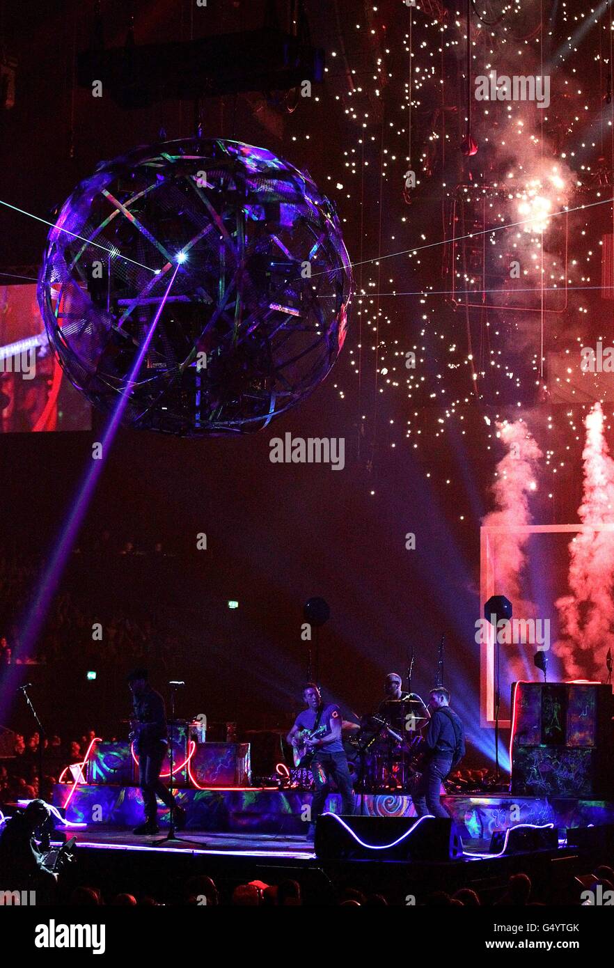 Coldplay perform on stage during the 2012 Brit awards at The O2 Arena ...