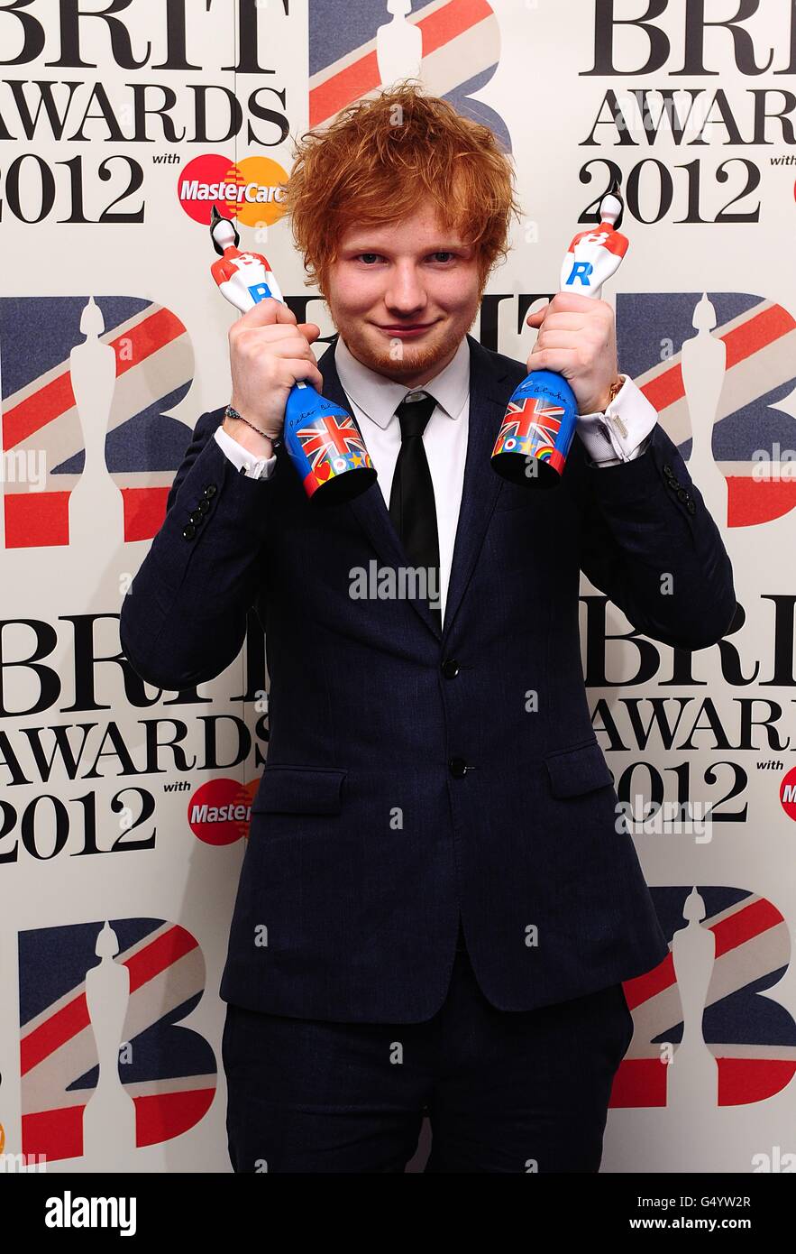 Ed Sheeran poses with his British Breakthrough Act award and Best Male ...
