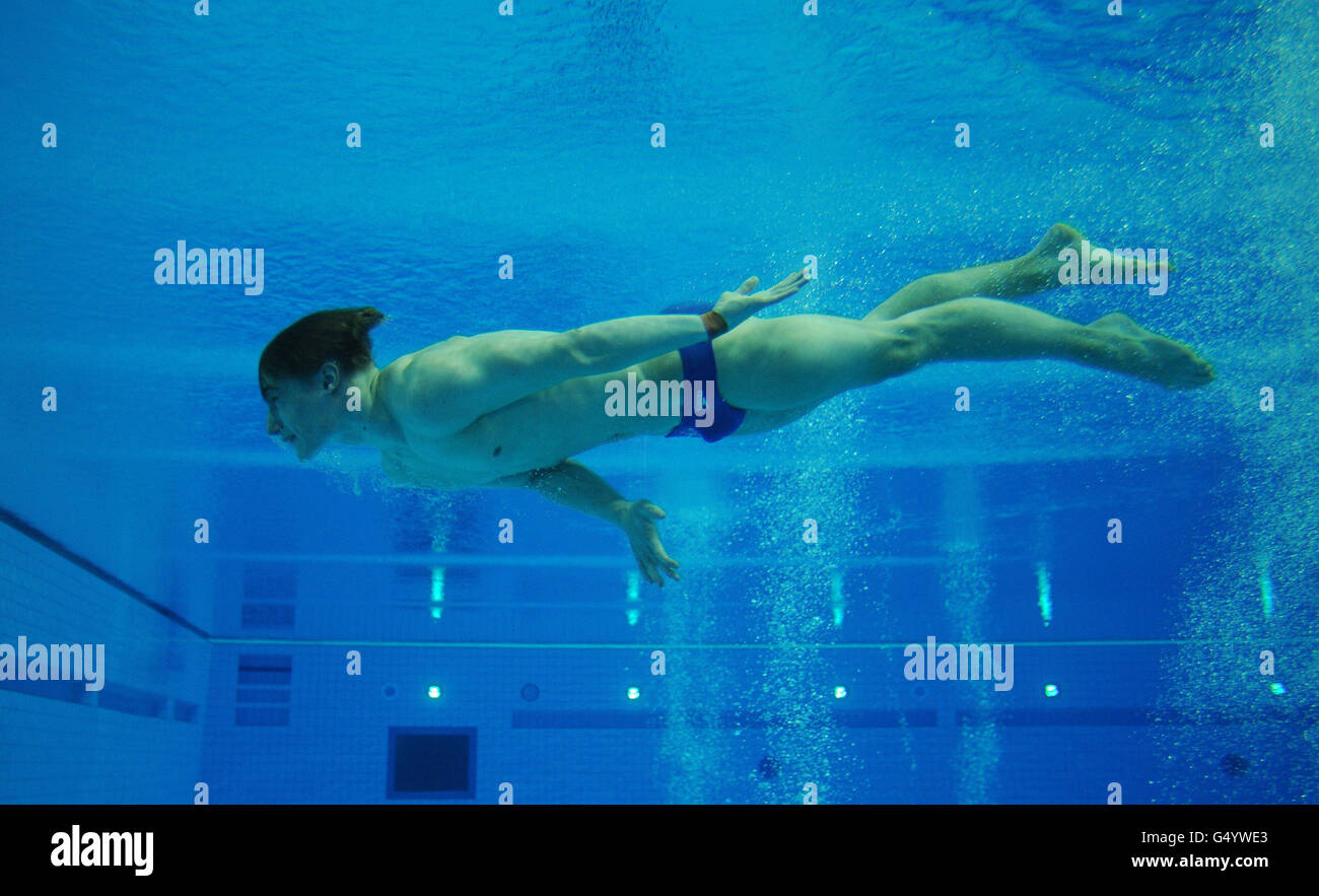 Great Britain's Jack Laugher swims back after completing a dive in the ...
