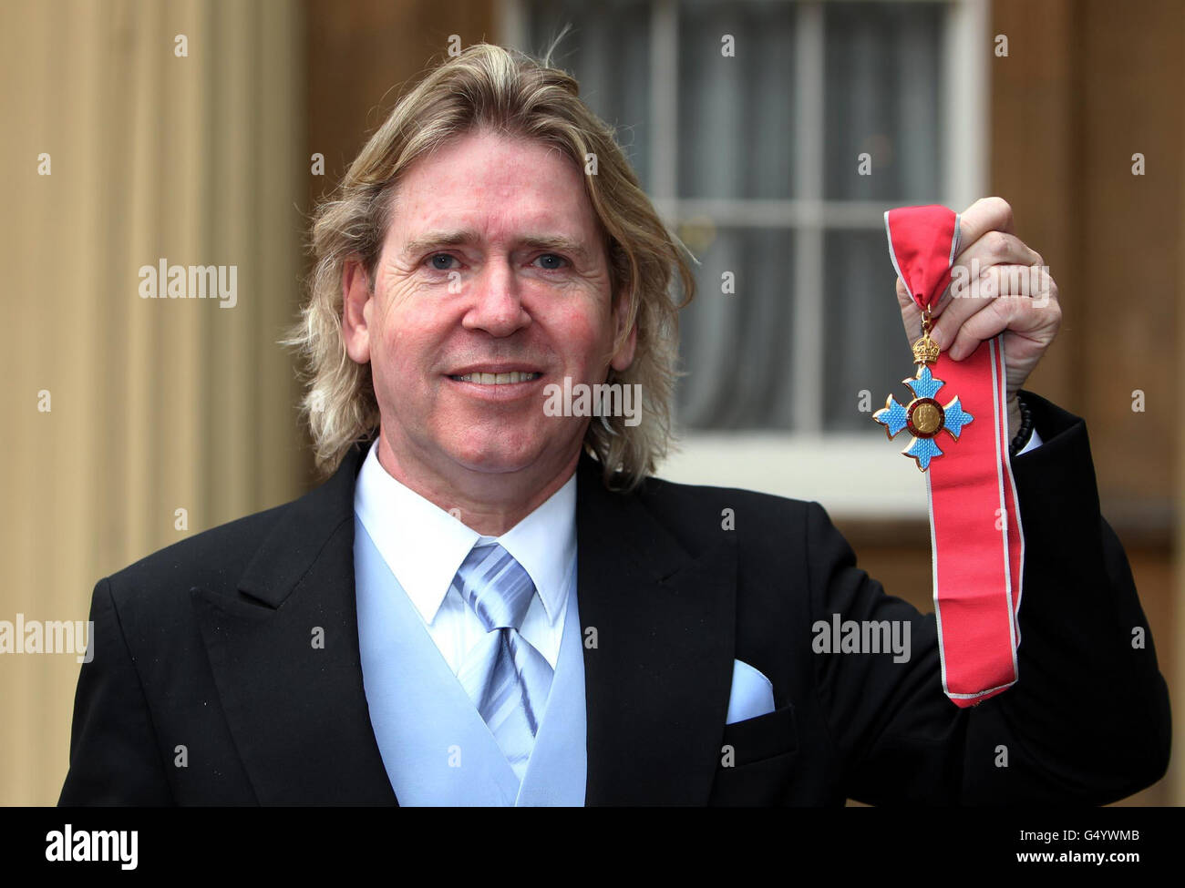 Stephen Lillywhite poses with his Commander of the British Empire (CBE ...