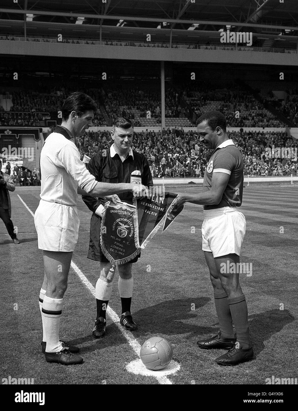 Cesare Maldini, centre-half and captain (left) of AC Milan exchanges ...