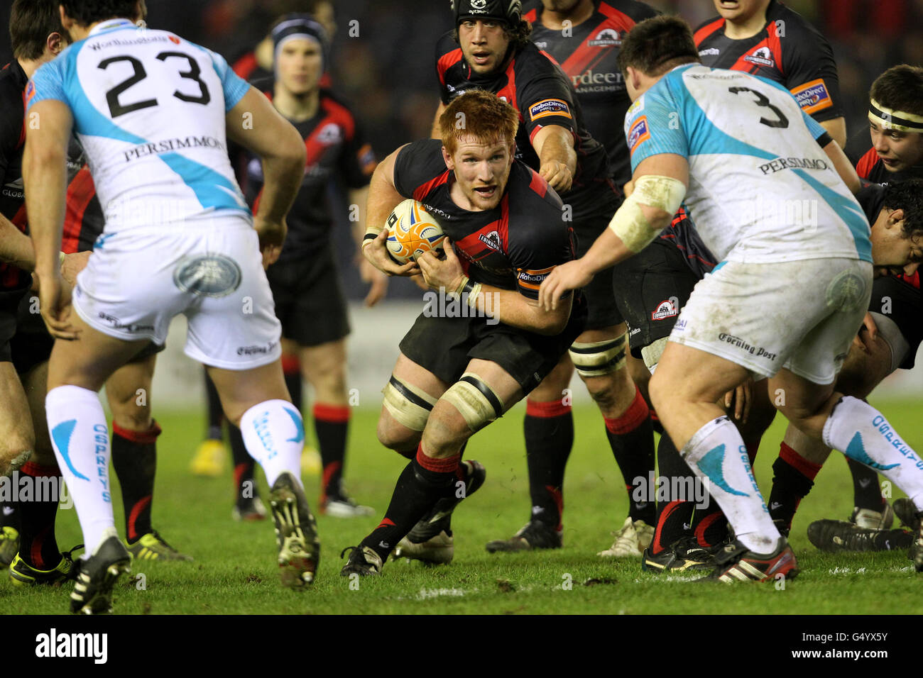 Edinburgh rugbys roddy grant centre charges at the ospreys defence hi ...
