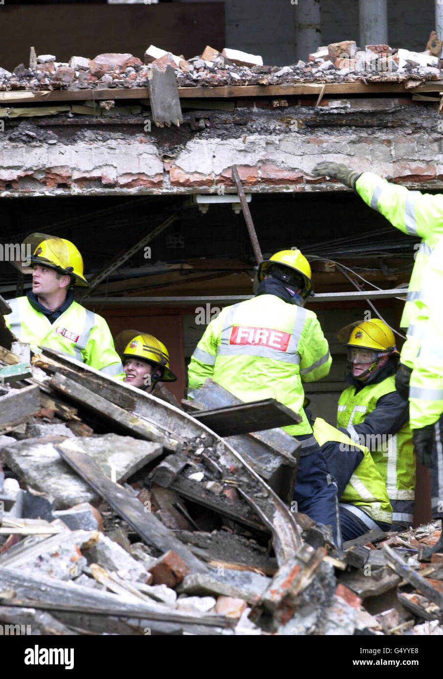Fire Service rescue workers searching the collapsed warehouse in Hull ...