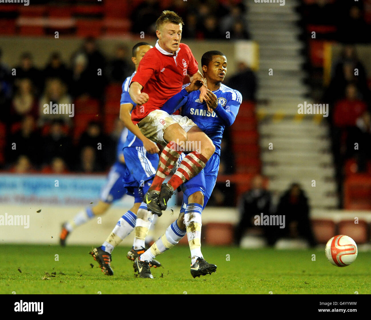 Nottingham Forest's Jack Blake (left) is challenged by Chelsea's ...