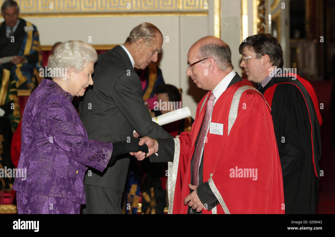 Queen Elizabeth II and The Duke of Edinburgh present a Royal ...