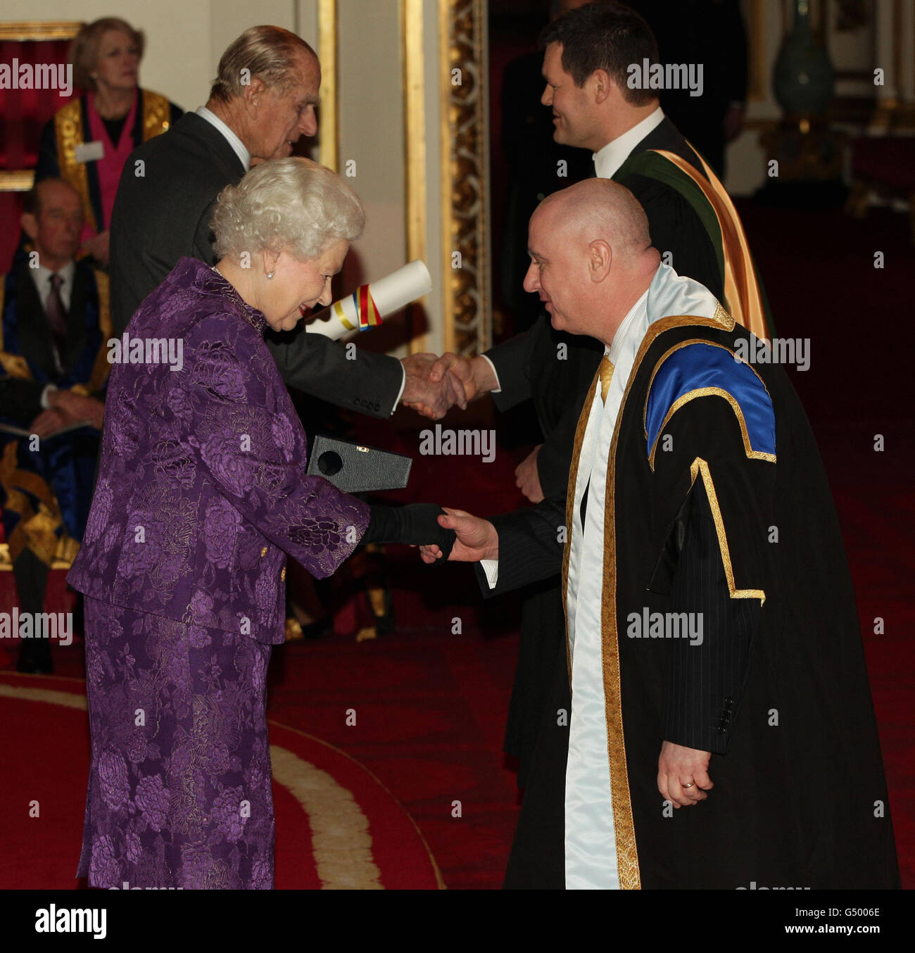 Queen Elizabeth II and The Duke of Edinburgh present a Royal ...