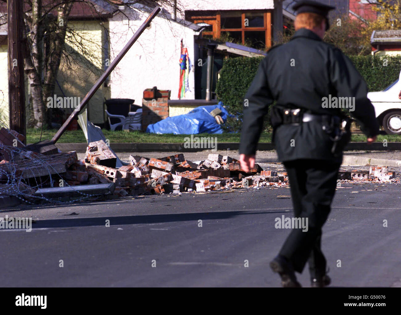 Bomb damage rubble police officer military base hi-res stock ...