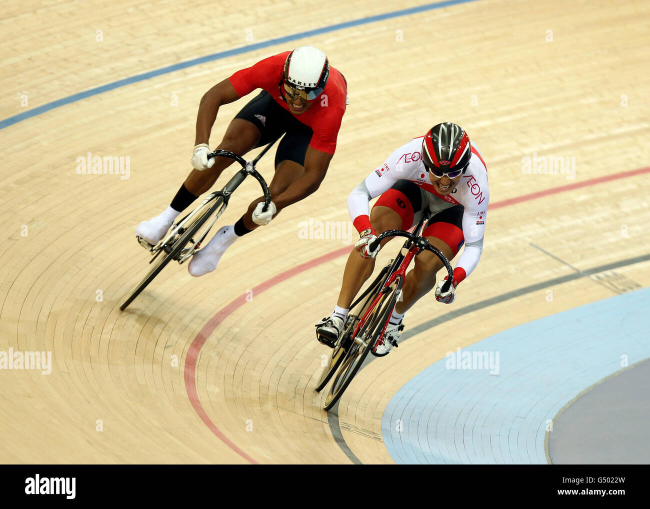 Japan's Kazunari Watanabe (left) with Trinidad and Tobago's Phillip ...