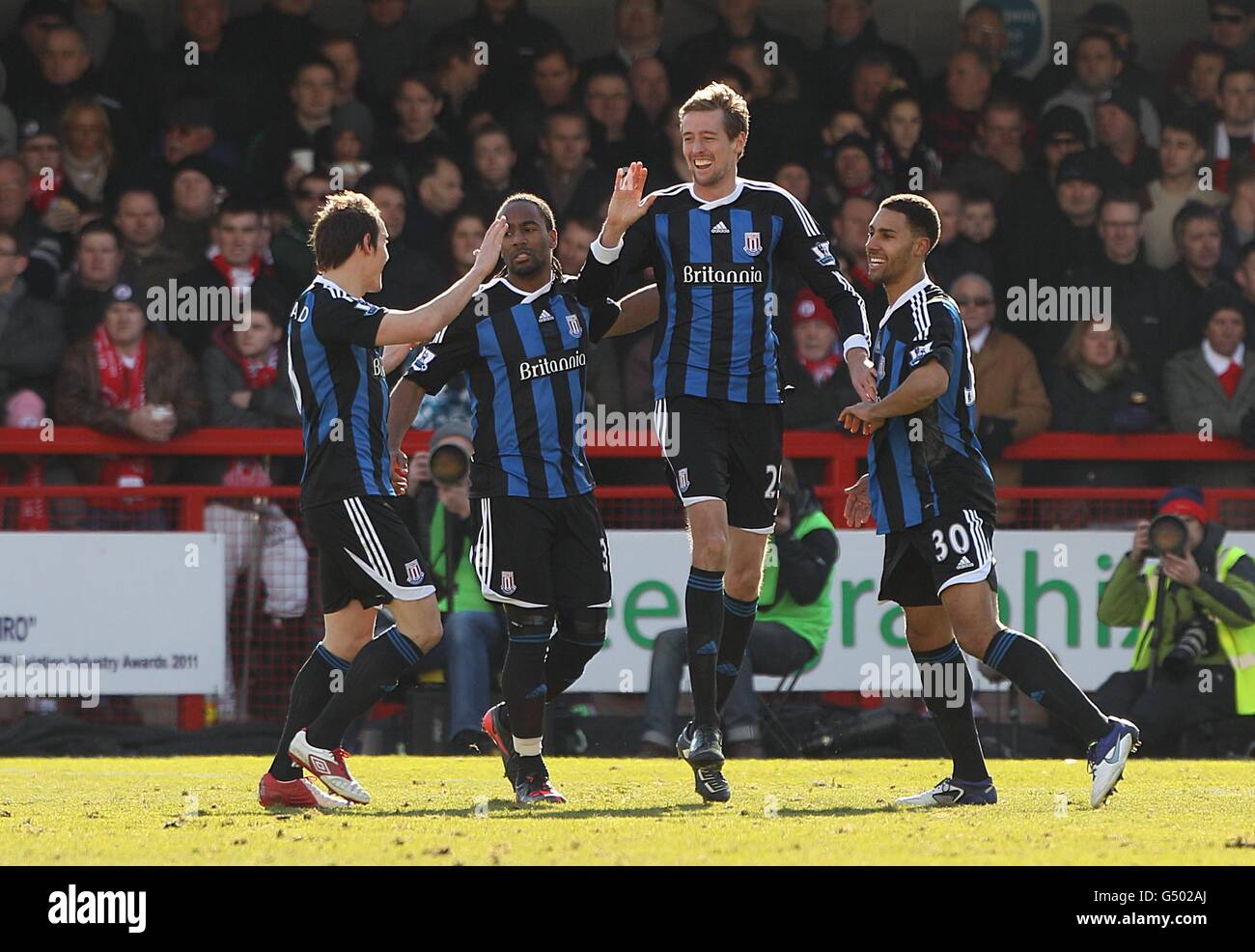 Stoke City's Peter Crouch (2nd right) celebrates with his team mates ...