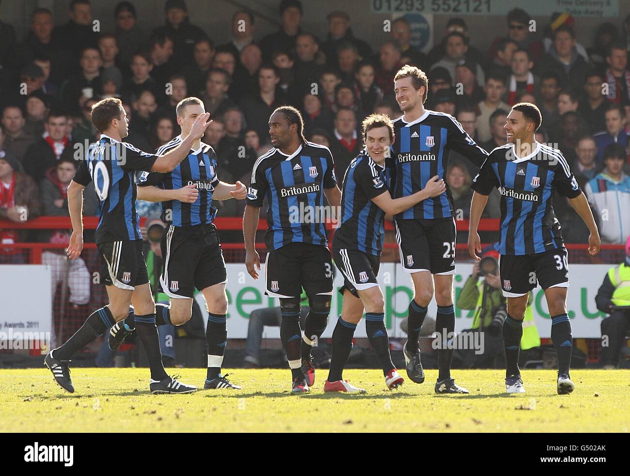 Stoke City's Peter Crouch (2nd right) celebrates with his team mates ...