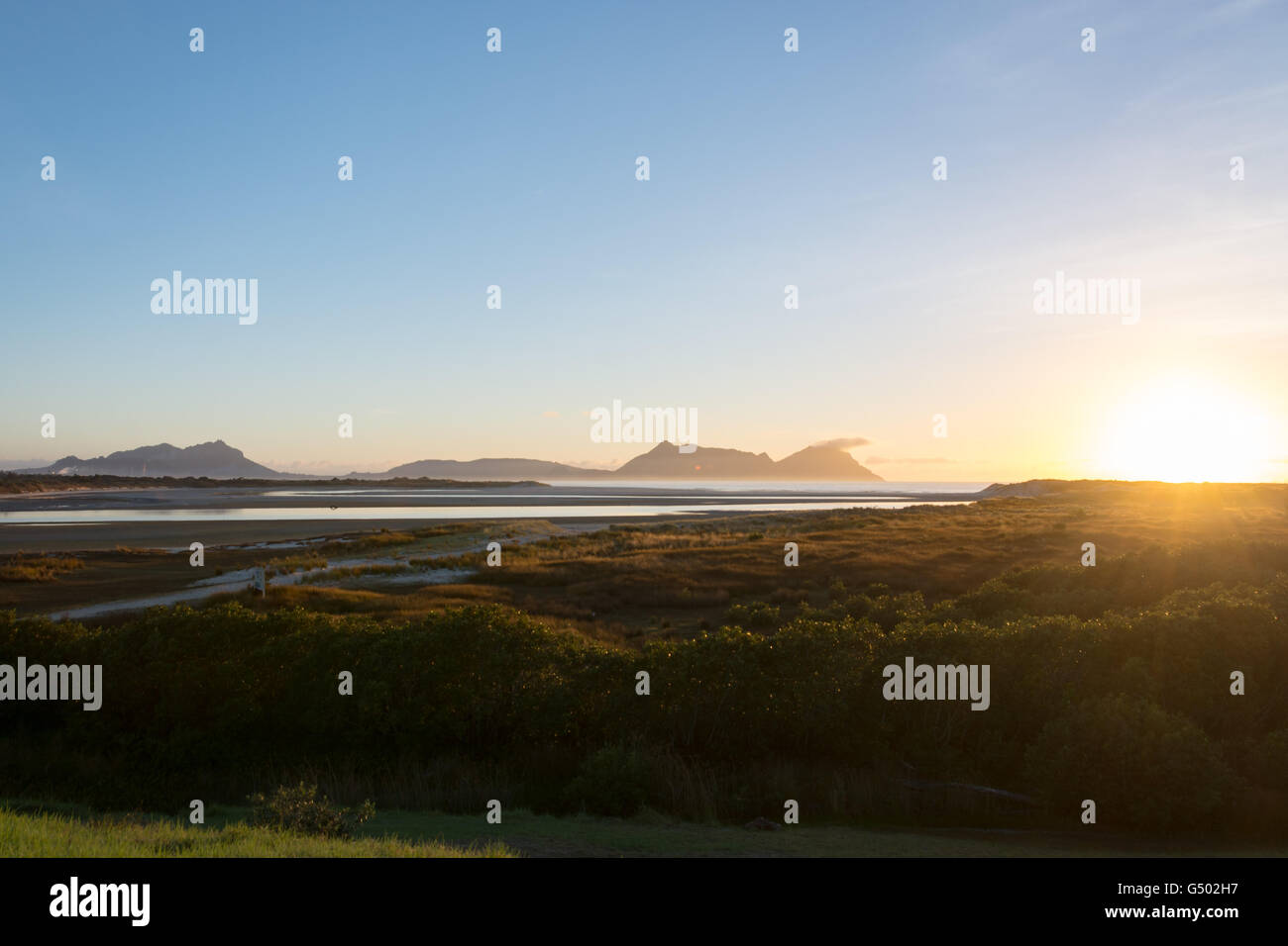 New Zealand, Northland, Ruakaka Beach, Sunrise at Ruakaka Beach Stock ...