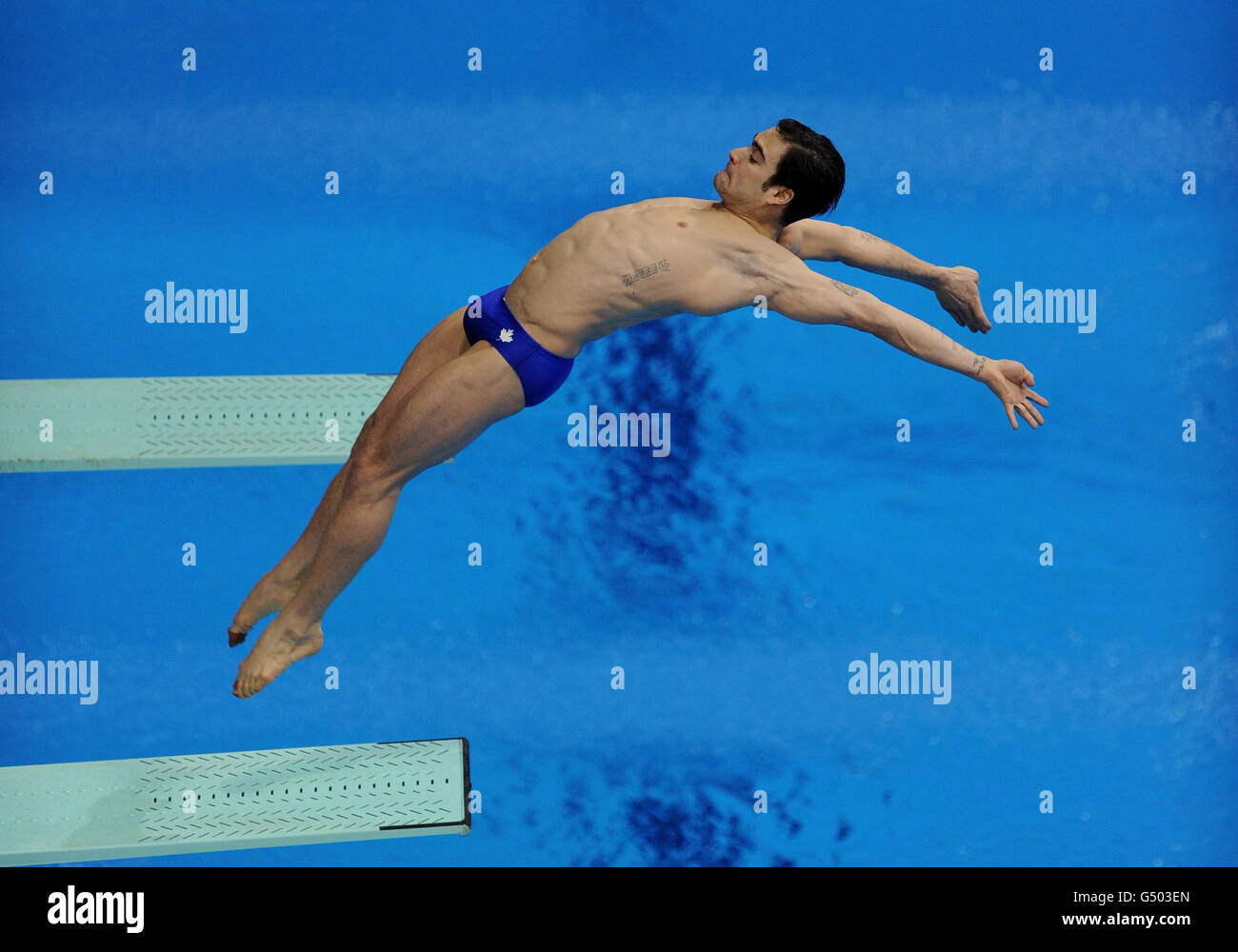 Canada's Alexandre Despatie in the Men's 3m Springboard Preliminary ...