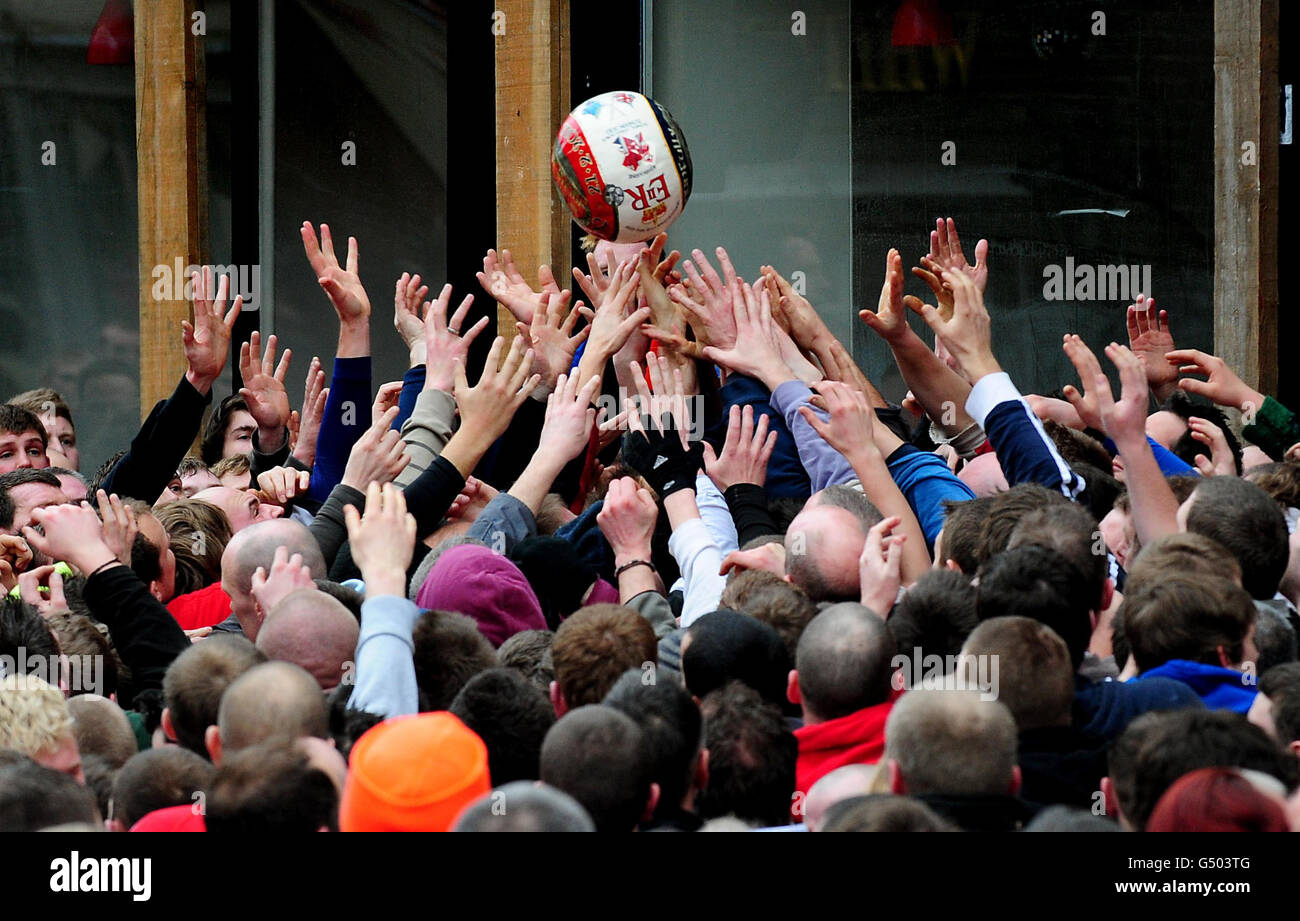 Players during the royal shrovetide football match in ashbourne hi-res ...