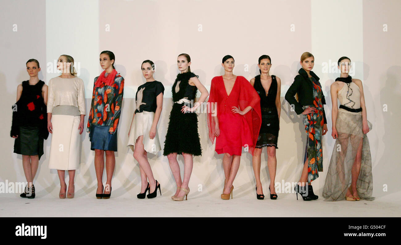 Models pose on the catwalk following the show by Claire Andrew, part of ...