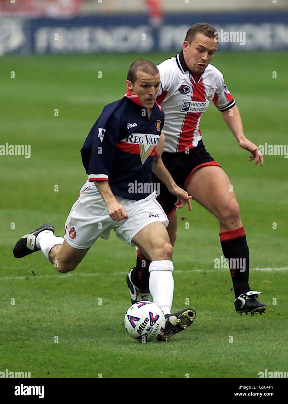Sport football action tackling alex rae hi-res stock photography and ...