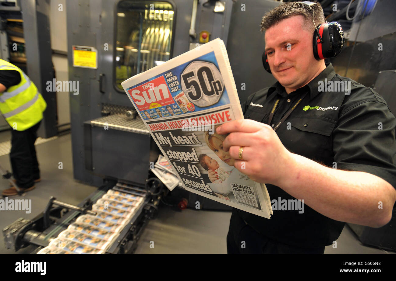 The first copies of the new Sun on Sunday newspaper roll off the ...
