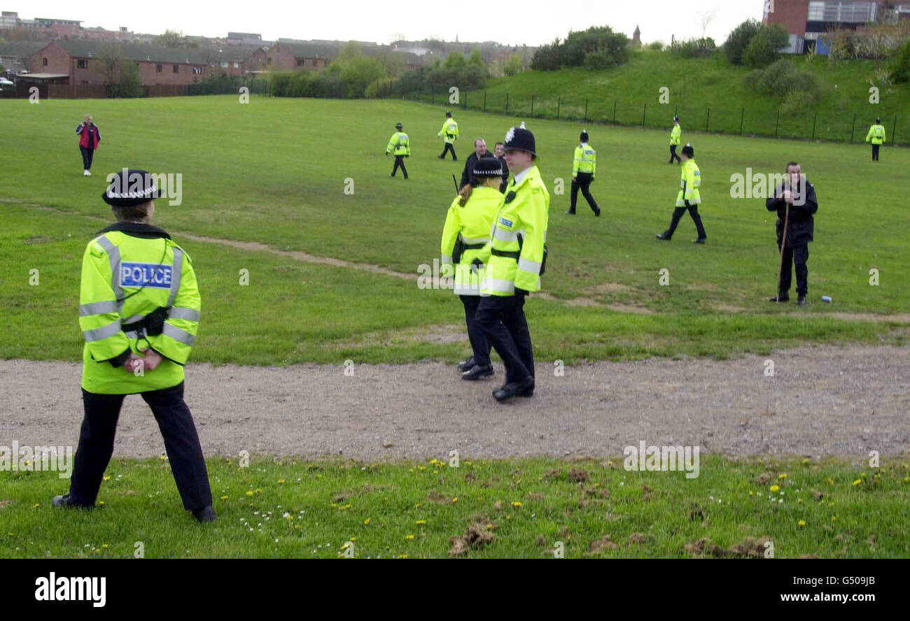 As police officers formed a line stretching for almost 1 hi-res stock ...