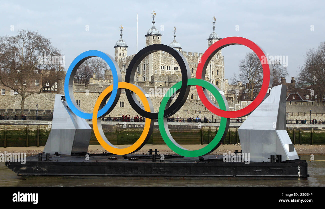 Giant Olympic rings pass the Tower of London, as they were launched on ...