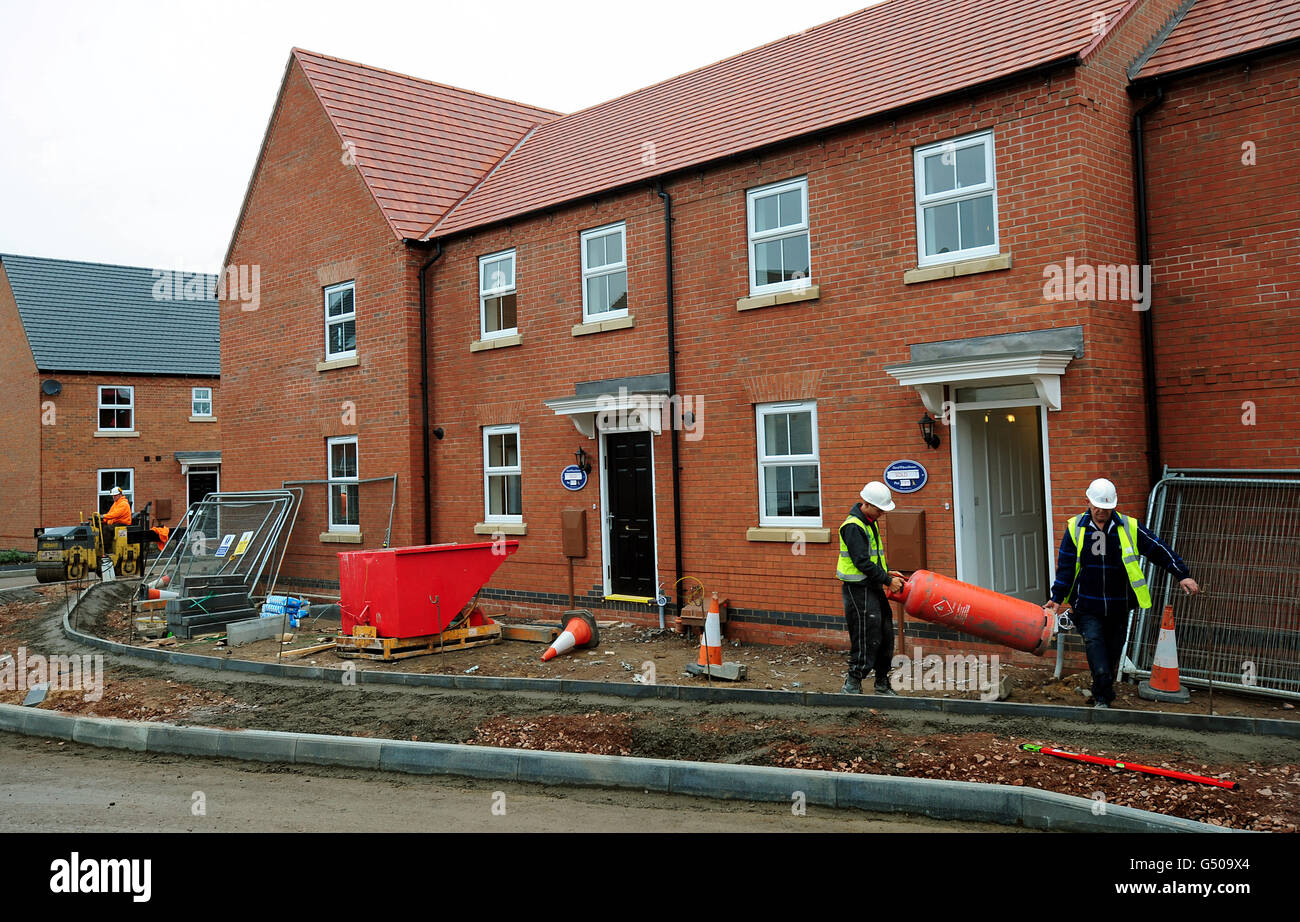 Building stock. A general view of workers building new houses in ...