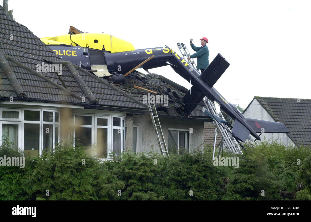 Helicopter police chasing hi-res stock photography and images - Alamy