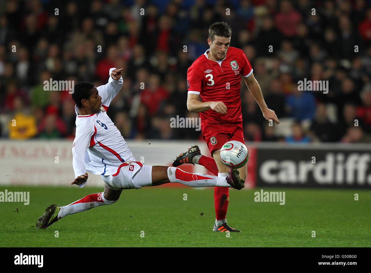 Wales' Adam Matthews (right) and Costa Rica's Kenny Cunningham battle ...