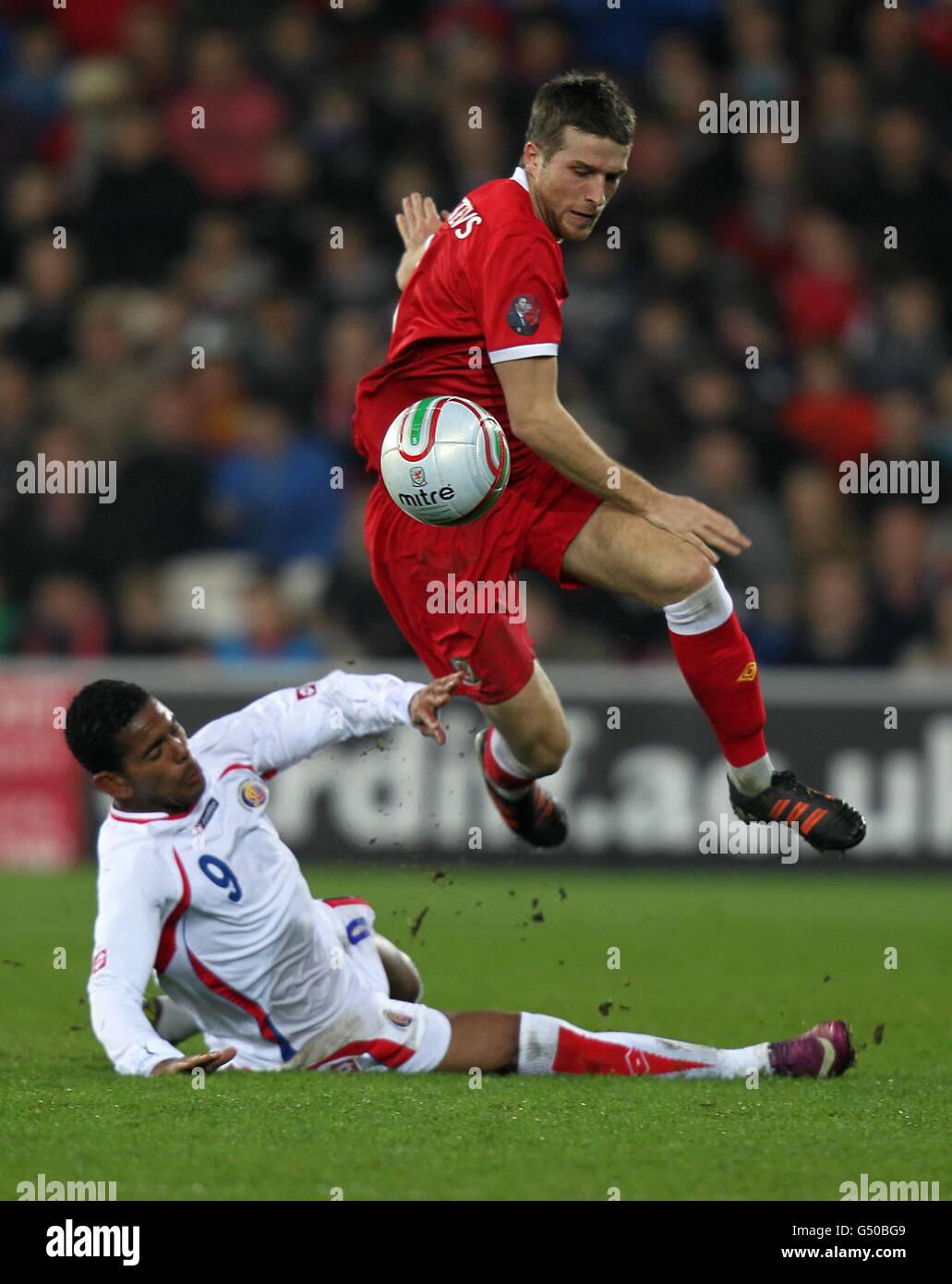 Wales' Adam Matthews (right) and Costa Rica's Kenny Cunningham battle ...