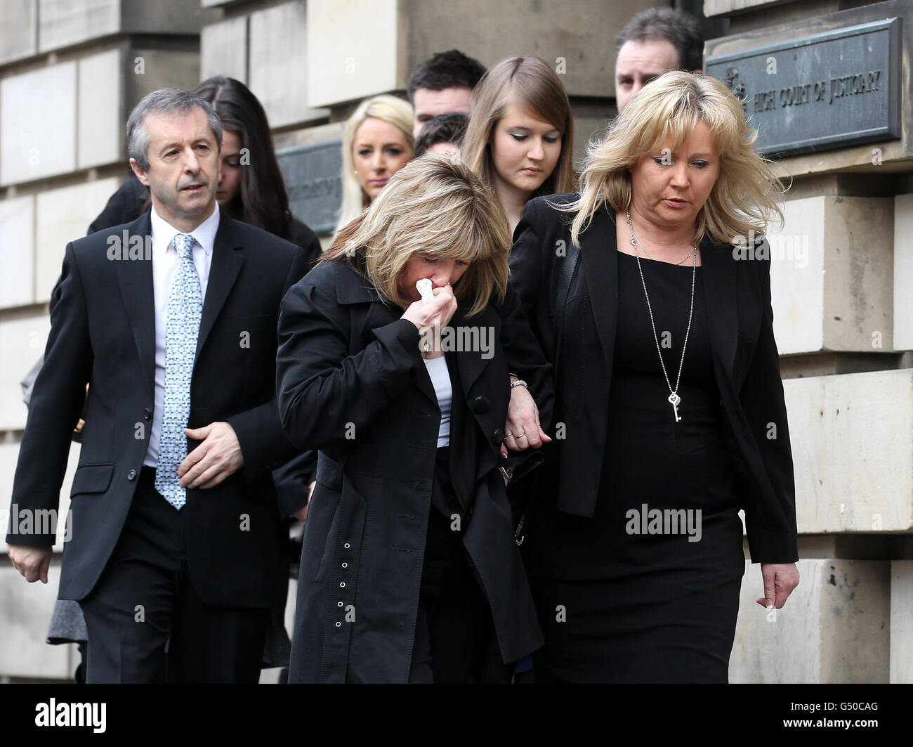 Mother of Jack Frew, Lorraine (centre), leaves the High Court in ...