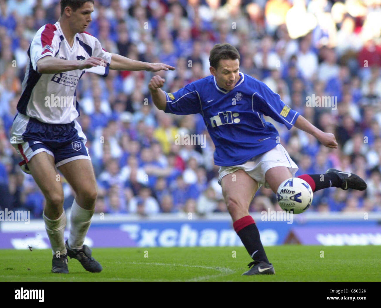 Rangers V Dundee Dodds. Ranger's Billy Dodds (right) holds off Lee ...