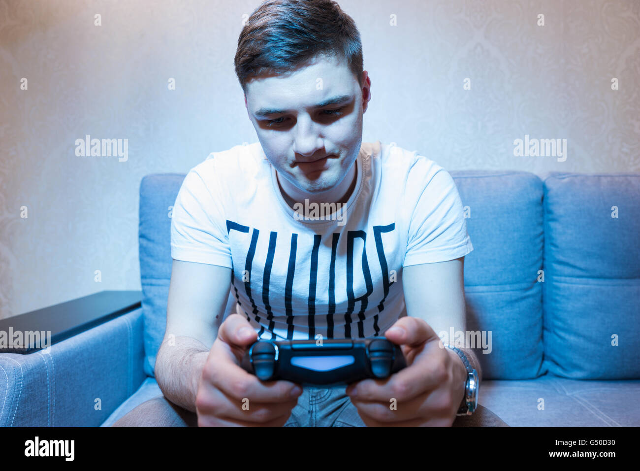 Man sitting in front of his tv set hi-res stock photography and images ...