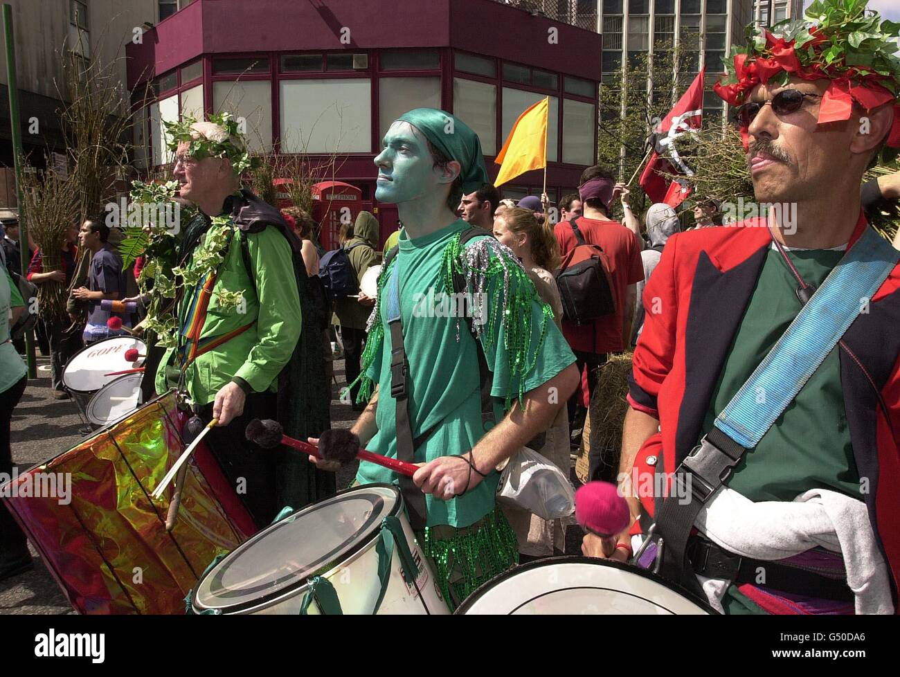 Drumming protestors join marchers heading towards London's Parliament ...