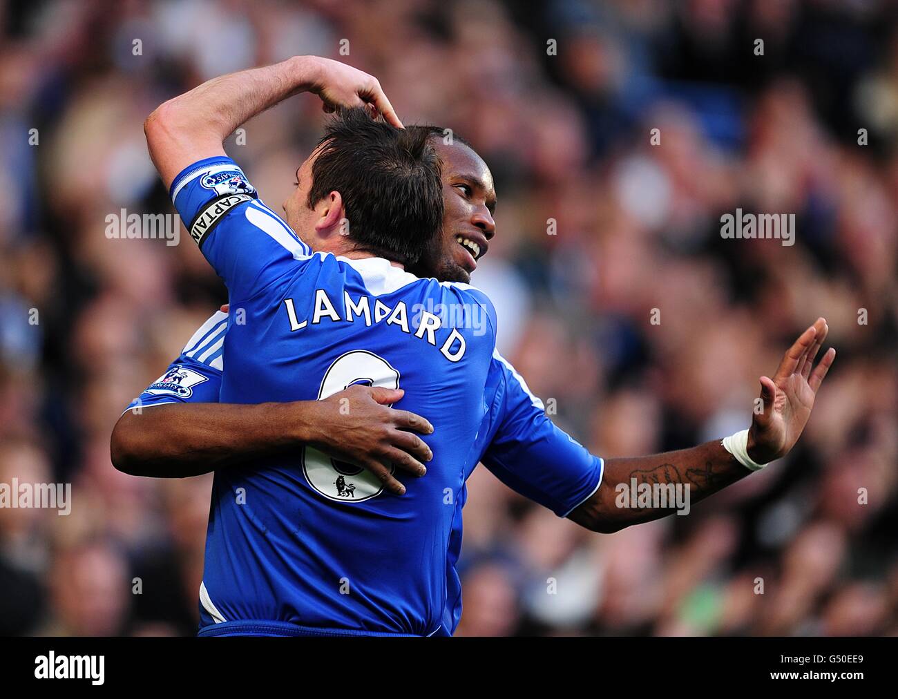 Chelsea's Didier Drogba (right) celebrates with team mate Frank Lampard ...