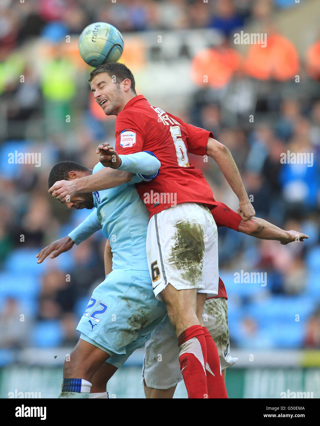 Coventry City's Clive Platt and Barnsley's Stephen Foster (right) in ...