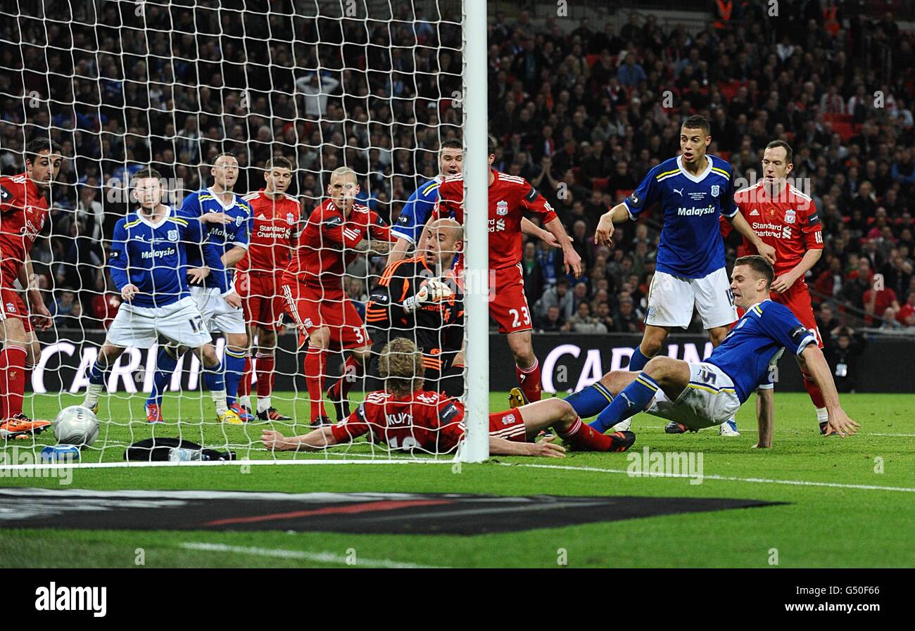 Cardiff City's Ben Turner (right) scores a late equaliser to make the ...