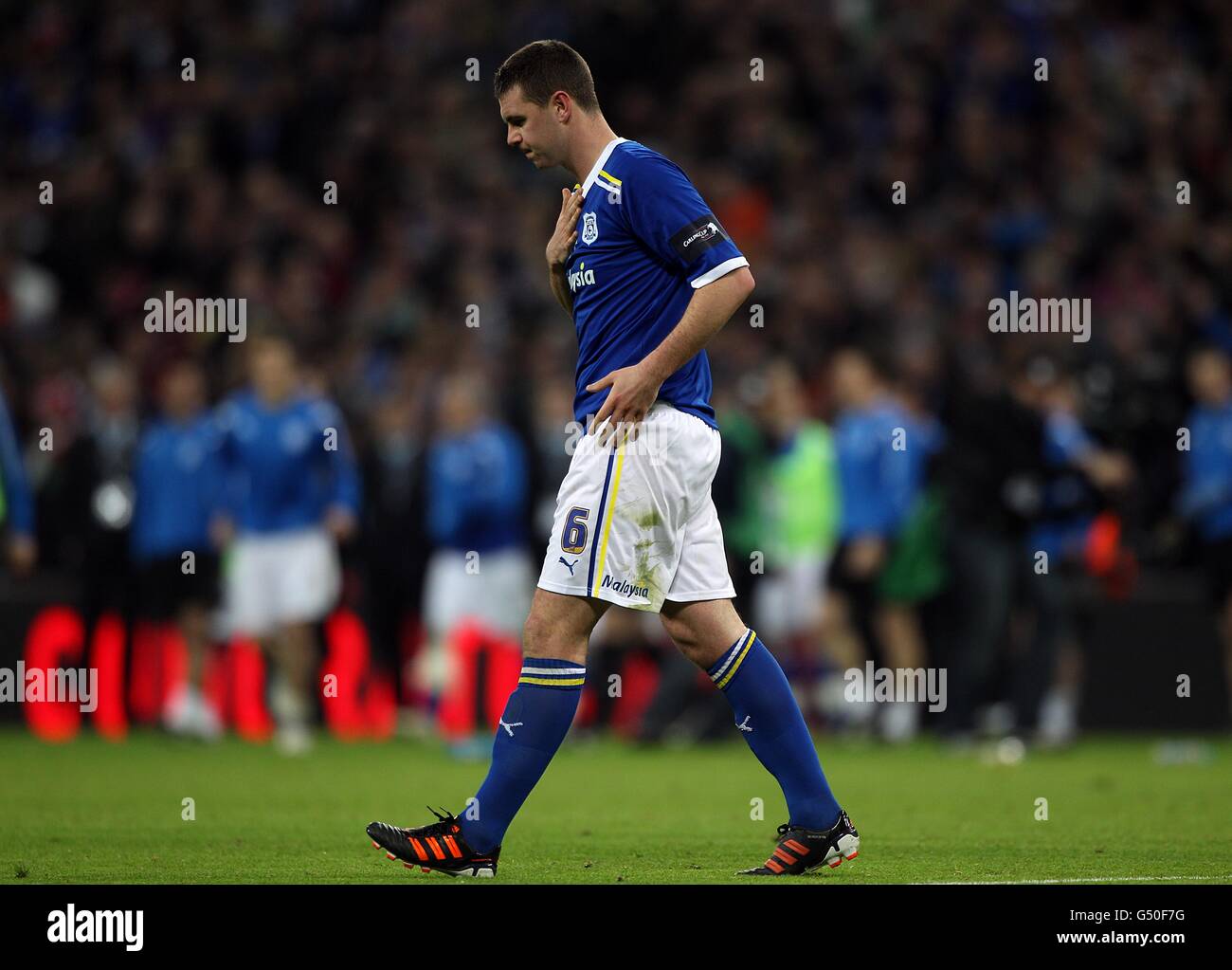 Cardiff City's Anthony Gerrard walks away dejected after missing the ...