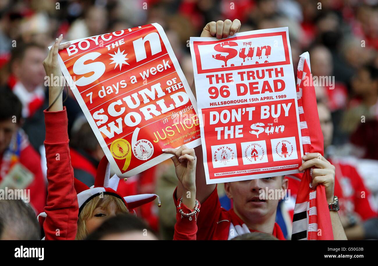 Liverpool fans show their dislike to The Sun newspaper in the stands ...